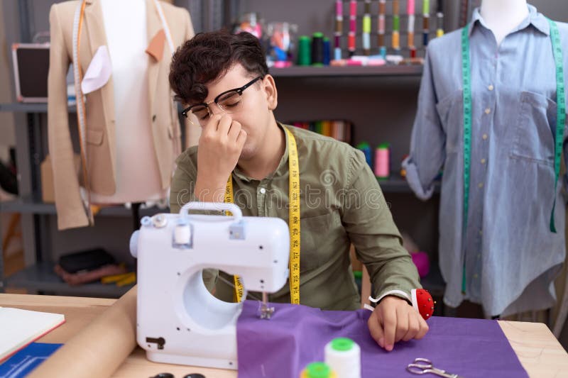 Non Binary Man Tailor Stressed Using Sewing Machine Suffering for ... Non Binary Man Tailor Stressed Using Sewing Machine Suffering for ...
