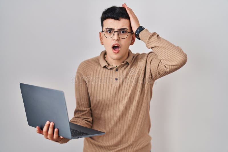 Non Binary Person Using Computer Laptop Crazy and Scared with Hands on ...