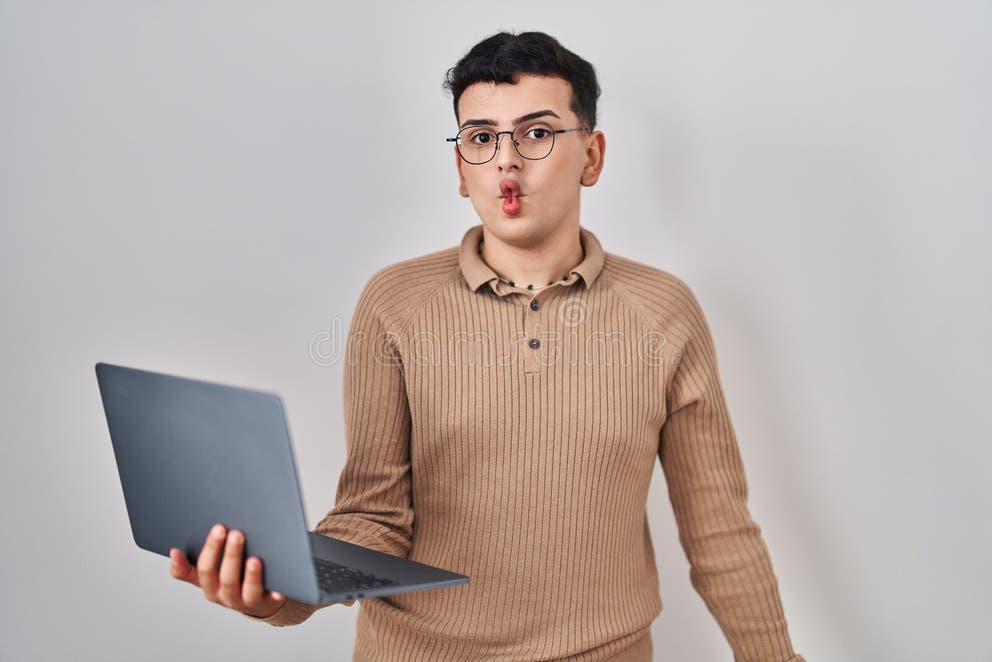 Non Binary Person Using Computer Laptop Making Fish Face with Lips ...