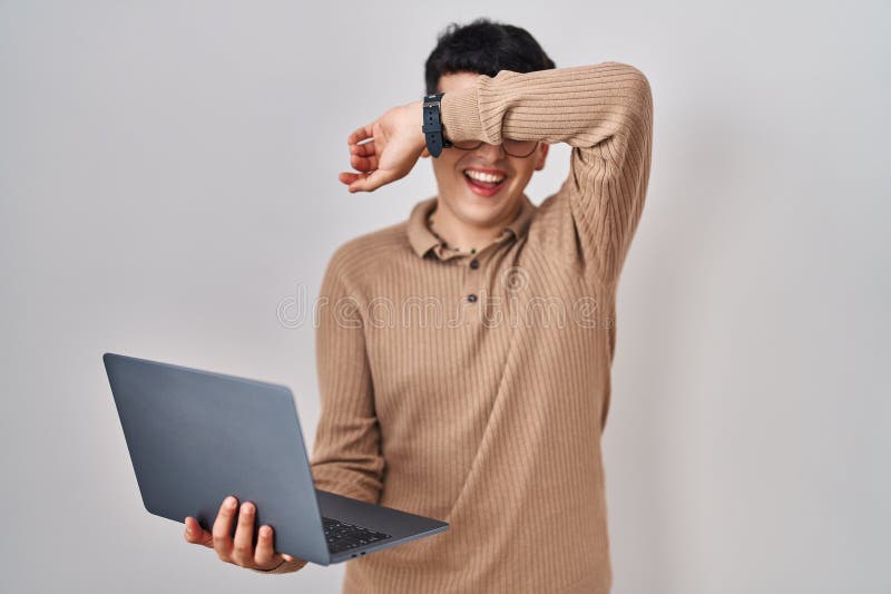 Non Binary Person Using Computer Laptop Smiling Cheerful Playing Peek a ...