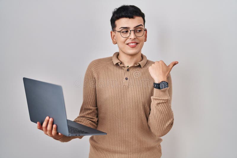 Non Binary Person Using Computer Laptop Smiling with Happy Face Looking ...