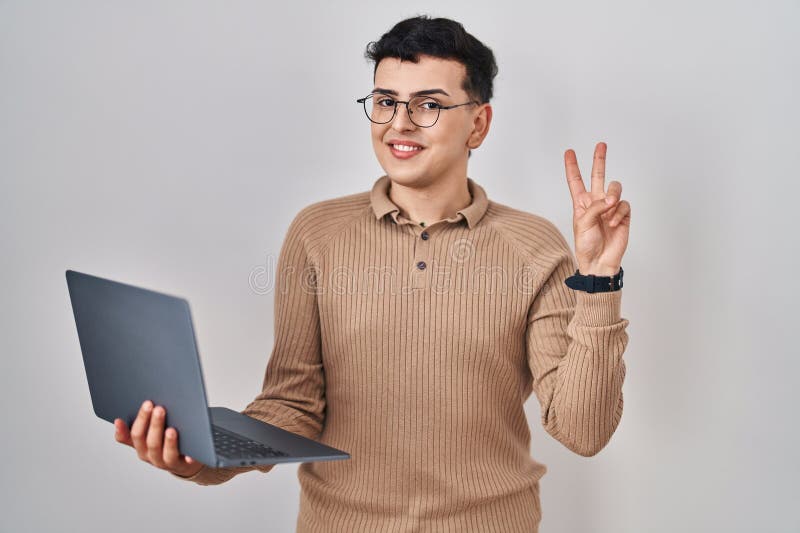 Non Binary Person Using Computer Laptop Smiling with Happy Face Winking ...