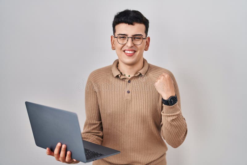 Non Binary Person Using Computer Laptop Very Happy and Excited Doing ...