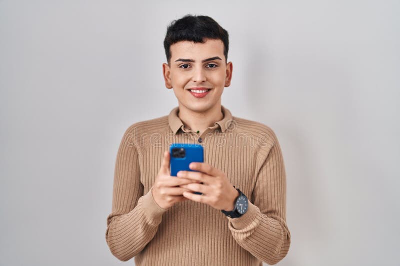 Non Binary Man Smiling Confident Using Smartphone at Street Stock Image ...