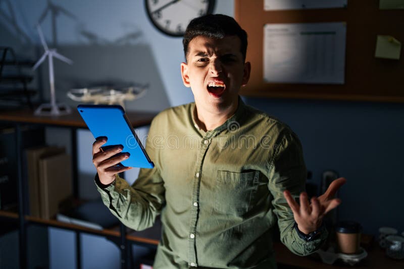 Non Binary Person Using Touchpad Device at Night Angry and Mad ...