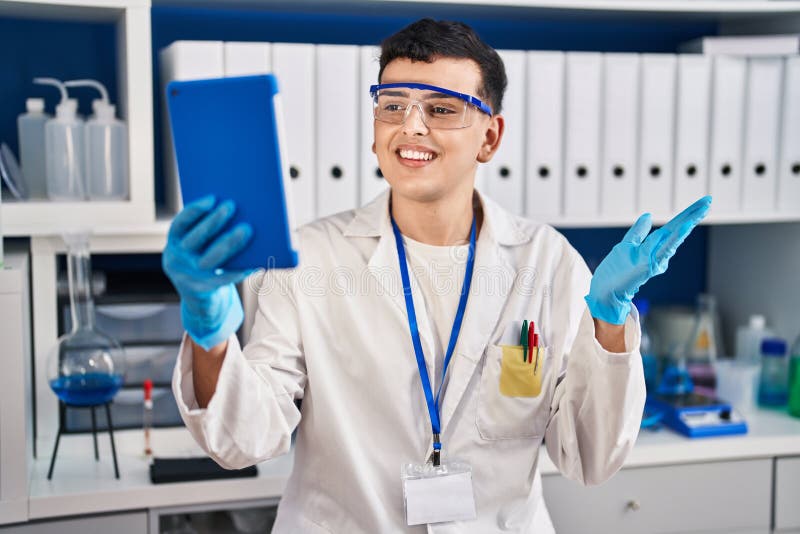 Non Binary Person Working at Scientist Laboratory Using Tablet ...