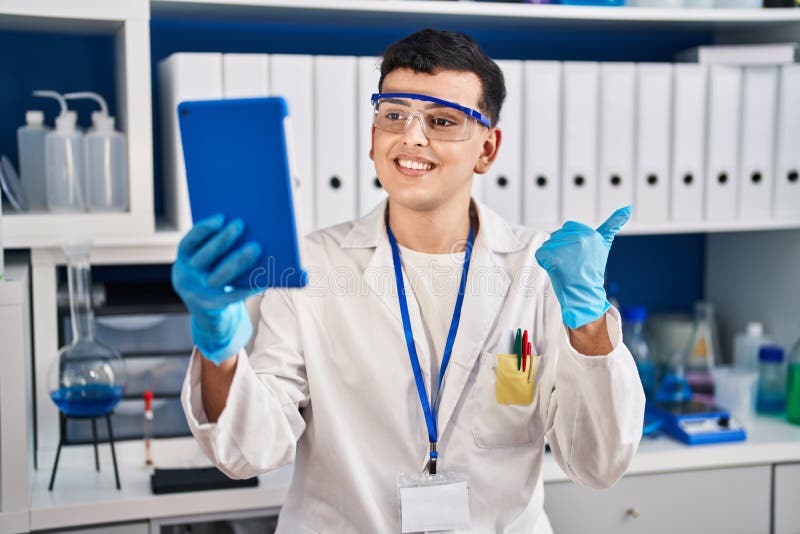 Non Binary Person Working at Scientist Laboratory Using Tablet Pointing ...