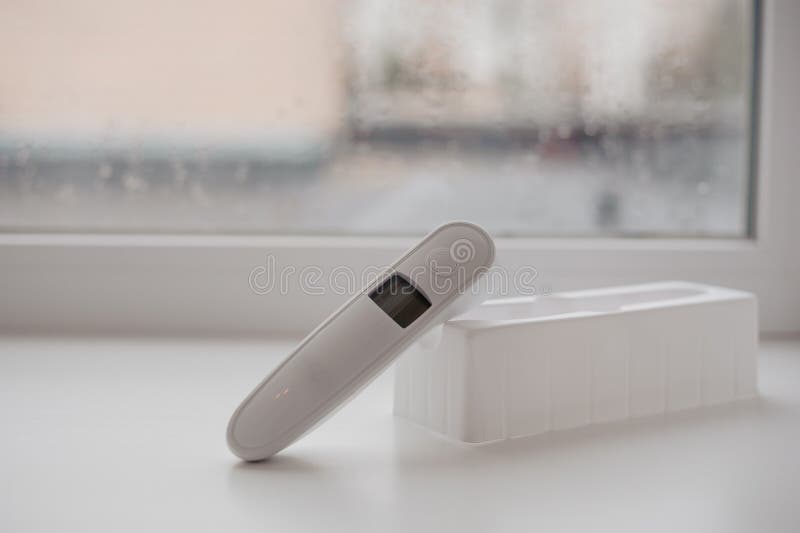 Non-contact Thermometer on a White Background for Measuring Body ...