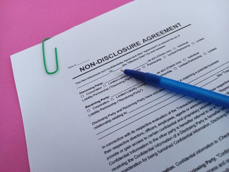 Non disclosure agreement stock photo. Image of signing - 303536844