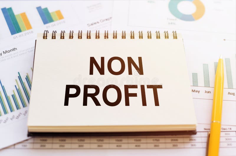 Non Profit - Written in a Notebook on the Background of Financial ...
