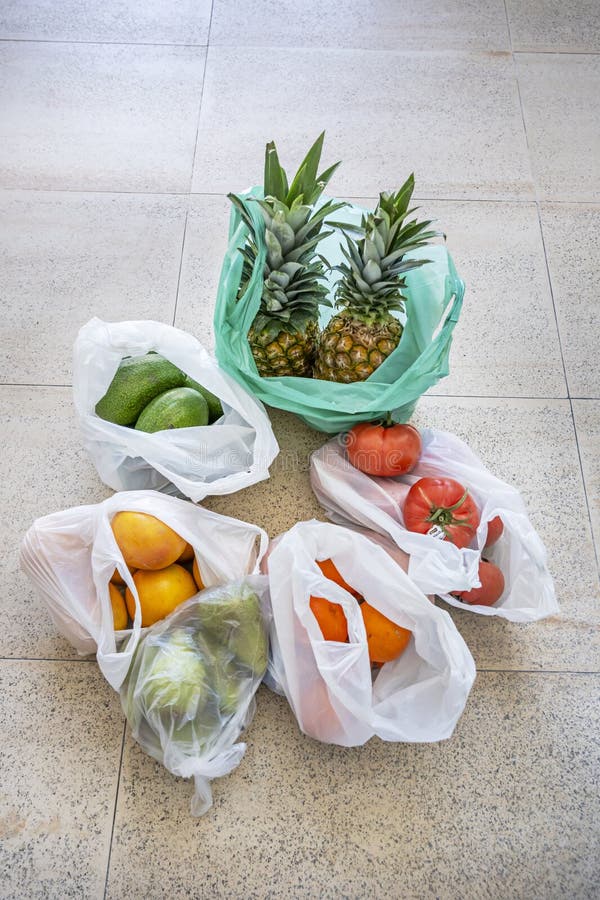 Non-recyclable Plastic Shopping Bags Filled with Fruit Stock Photo ...