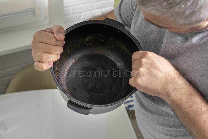 The Non-stick Coating of the Pan is Damaged Stock Photo - Image of burn ...