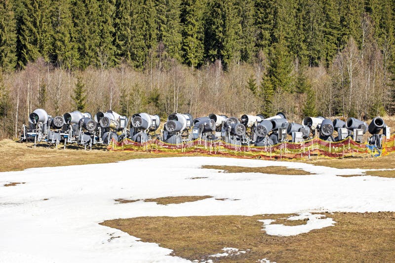 Non-working Snow Generator on a Slope without Snow Gear at a Resort on ...