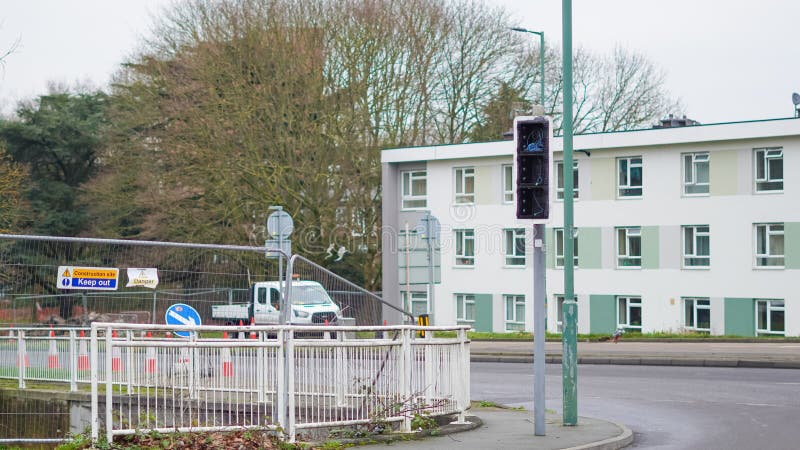 A Non-working Traffic Light at an Urban Intersection on a Cloudy Day ...