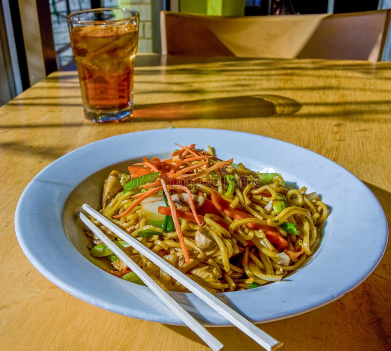 Noodle Dish and Iced Tea stock image. Image of dish, vegetable - 8377779