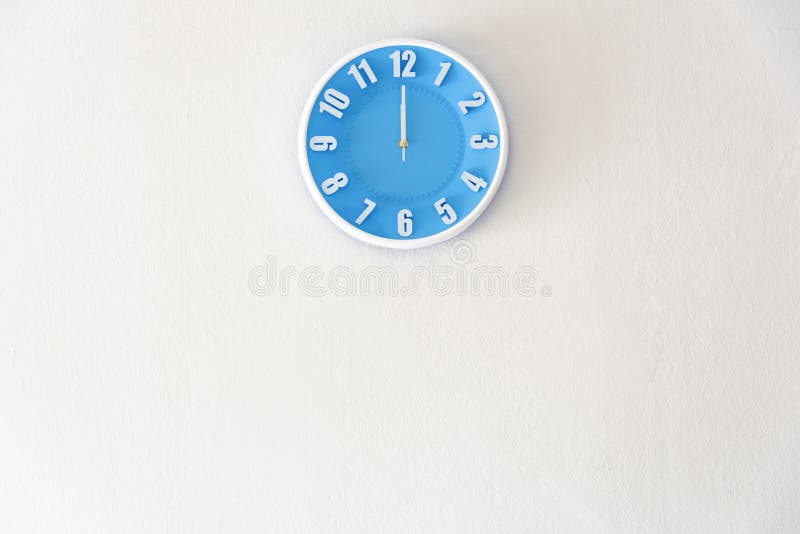 Noon or Midnight Time with 12:00 Clock on White Concrete Wall in Stock ...