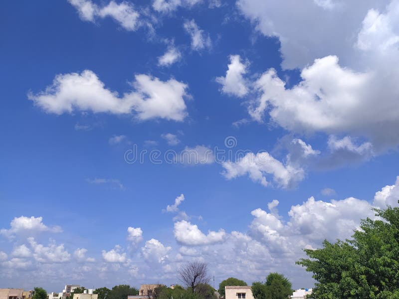 Noon time with clouds stock photo. Image of noomtime - 195180198