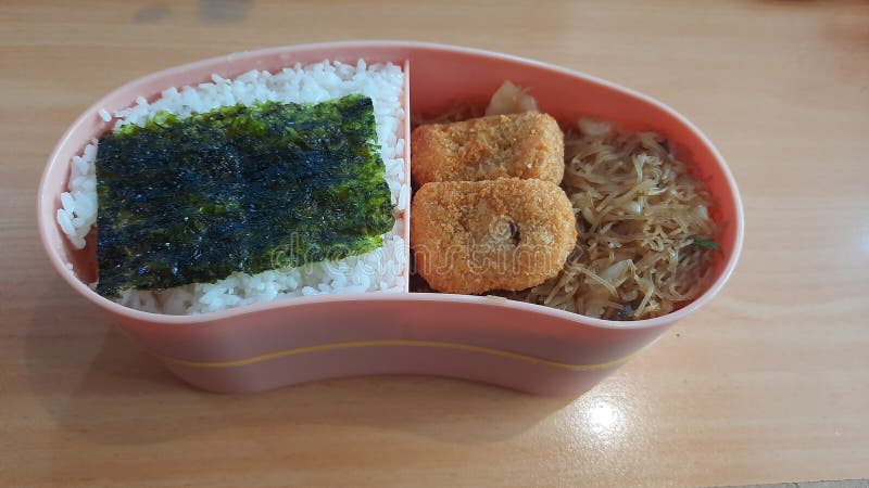 Nori bento and nuggets stock photo. Image of salad, meal - 209459718