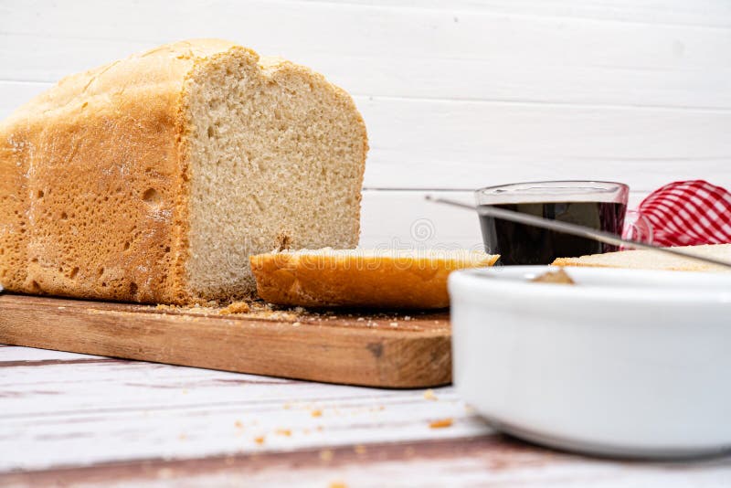 Normal View of a Homemade Bread, Slices and Some Sweet in a Pot on a ...