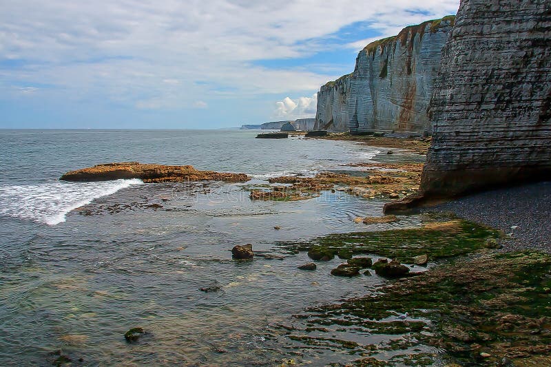 Normandy limestone cliffs stock photo. Image of crevice - 95617748