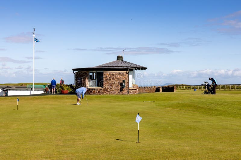 Golfers on a Sunny Day at the Putting and Chipping Practice Areas ...