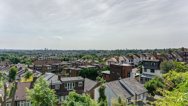North London Skyline with Green Trees in the Foreground Stock Image ...