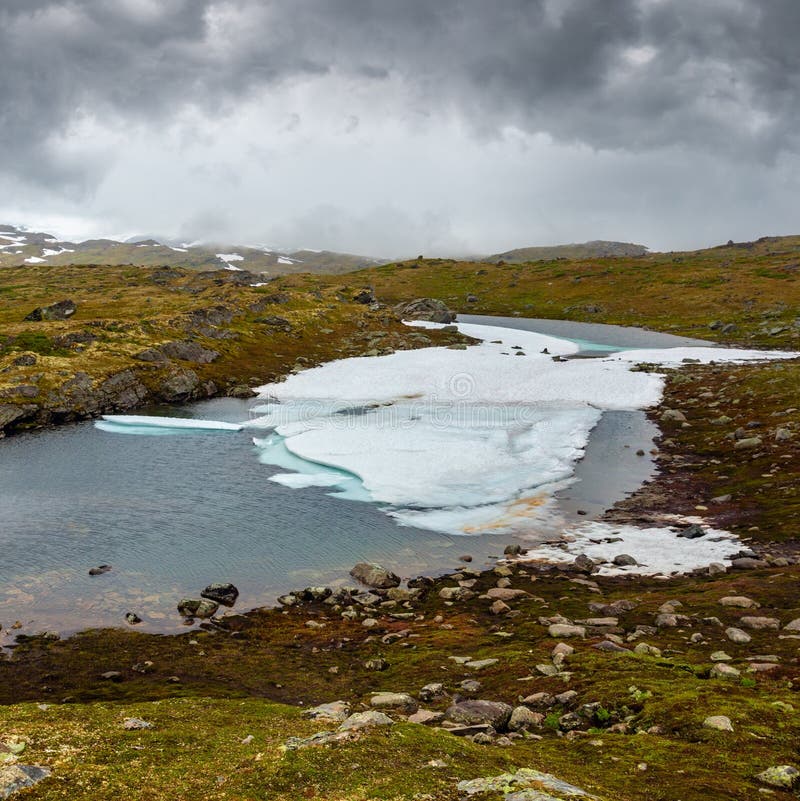 North Norway Mountain Spring Tundra Valley and Puddle with Ice Cake ...