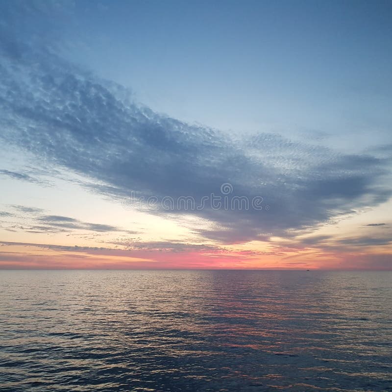 North Sea. Morning. Clouds Like a Bird Stock Photo - Image of dawn ...