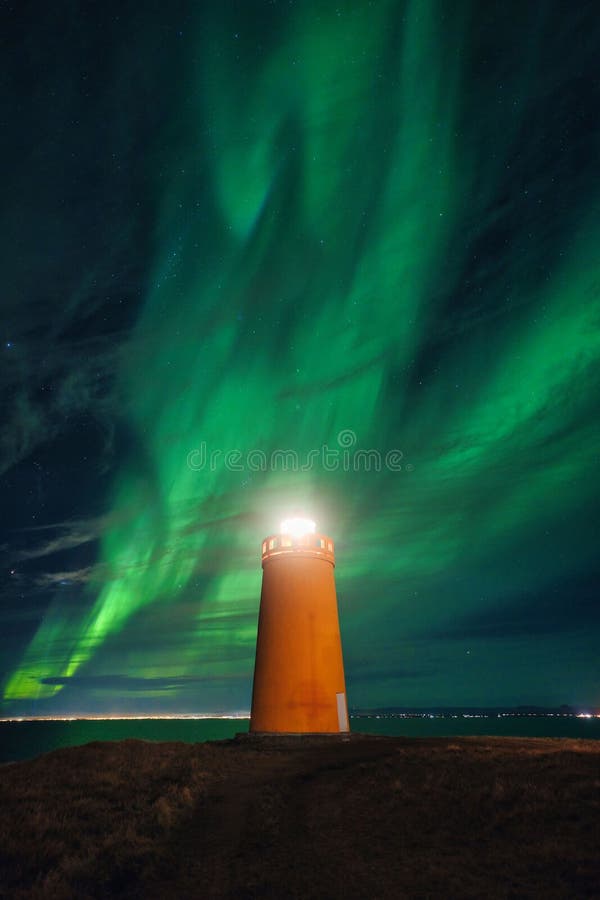 Northern Lights Aurora Borealis Over Lighthouse in Iceland Stock Image ...