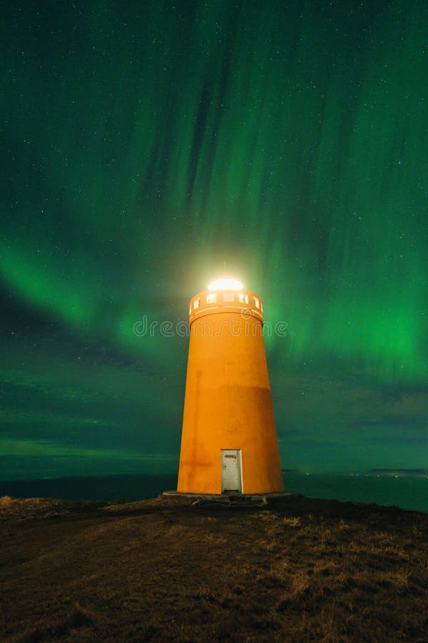Northern Lights Aurora Borealis Over Lighthouse in Iceland Stock Photo ...