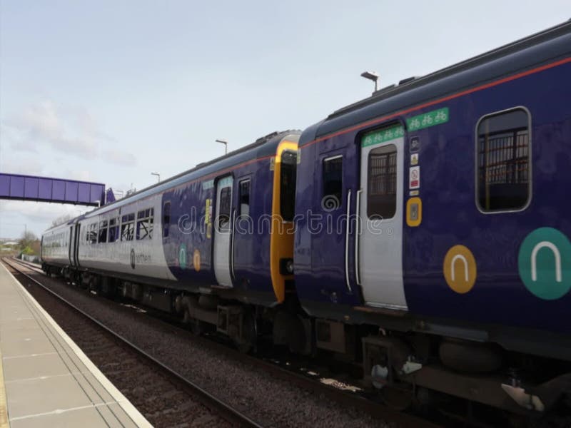 Northern Rail Train Pulls into Railway Station Platform Stock Footage ...