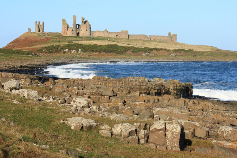 Northumberland Coast with Dunstanburgh Castle in Background Stock Image ...