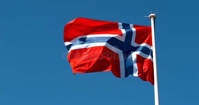 Norvegian Flag Waving in the Wind Against Blue Sky Stock Image - Image ...