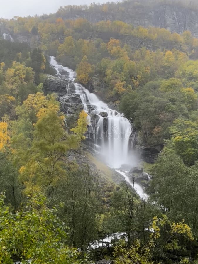 Large Waterfalls Flowing Down To the Fjords in Autumn in Norway Stock ...