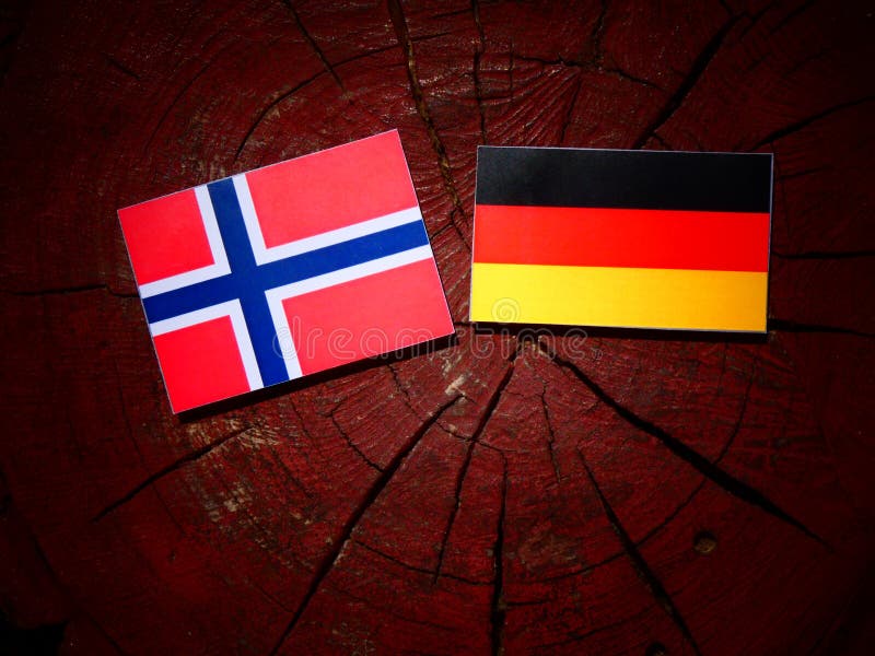 Norwegian Flag with German Flag on a Tree Stump Stock Image - Image of ...