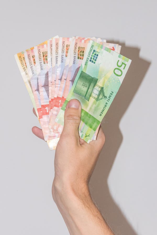 Norwegian Krone NOK Banknotes in the Hand Stock Photo - Image of table ...