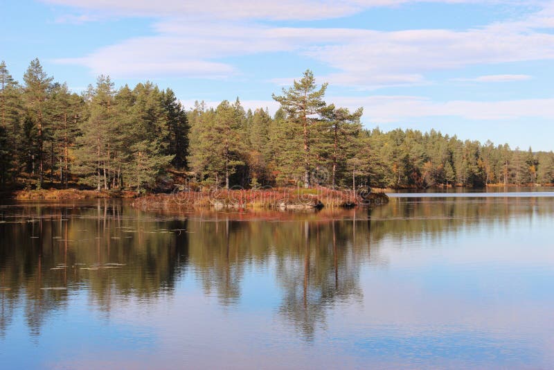 Norwegian Lake Frozen Over on a Small Island Stock Image - Image of ...