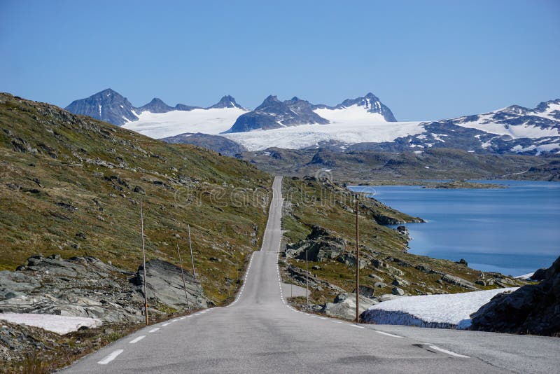 Norwegian Straight Road in the Mountains with a Glacier in the ...