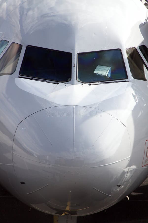 Nose of an Commercial Airliner Stock Image - Image of windows, business ...