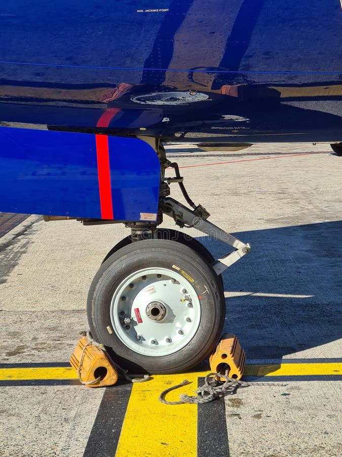 Nose wheel of an airliner editorial image. Image of aircraft - 269410995
