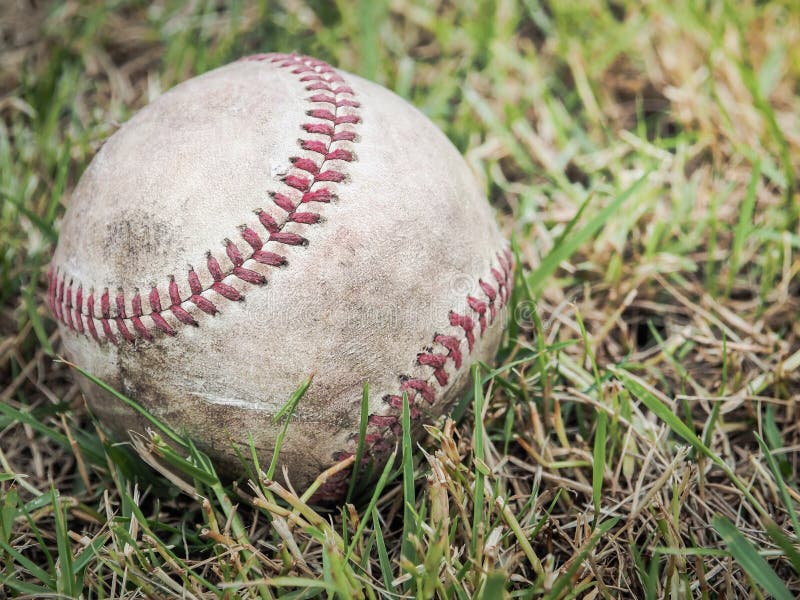 Nostalgic Baseball in the Grass Stock Photo - Image of afternoon ...