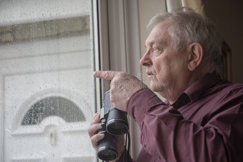Nosy Neighbor Looking through Window with Binoculars Stock Image ...