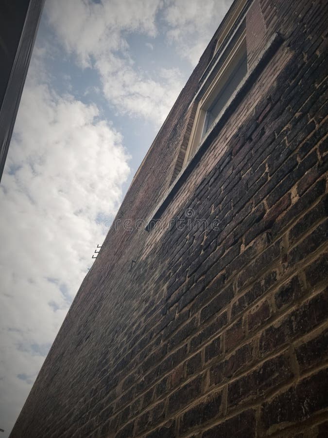 Not alone stock image. Image of alone, brick, pure, building - 112492441