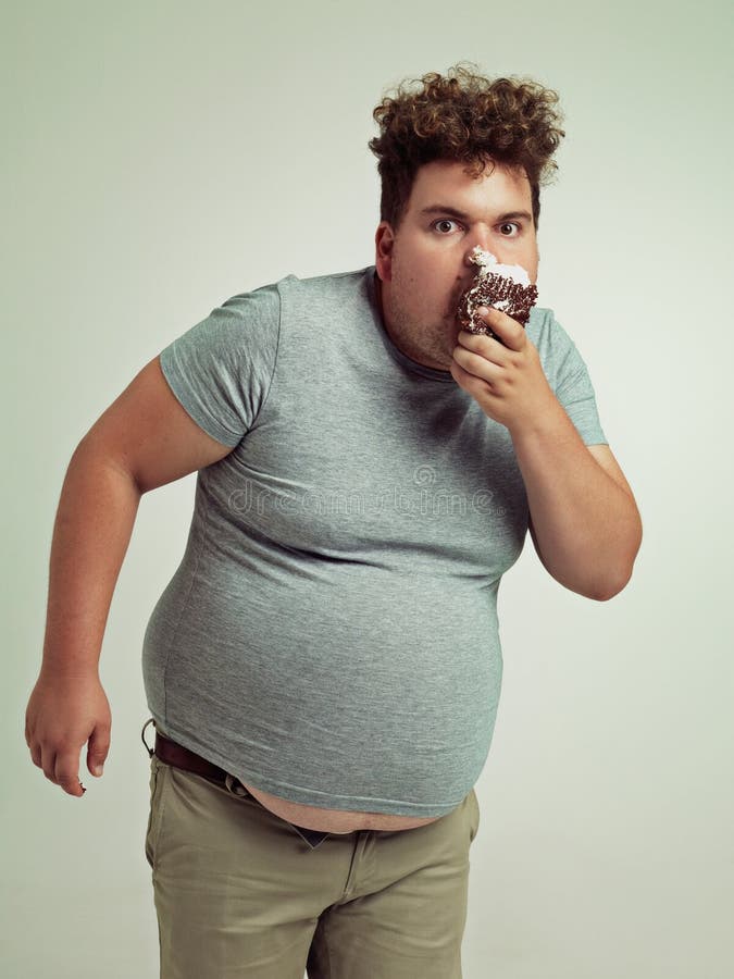 This is Not Cake...an Overweight Man Messily Eating a Slice of Cake ...