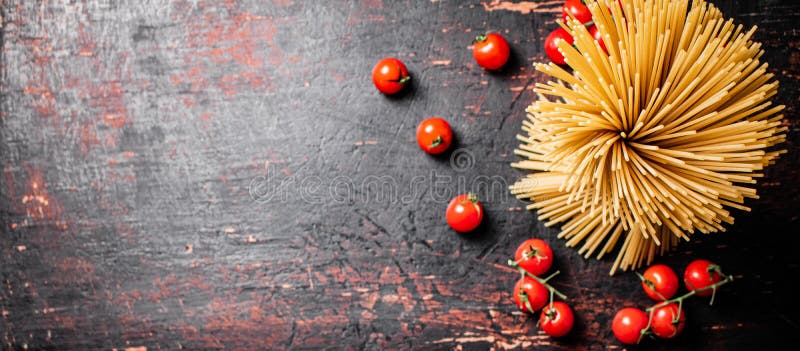 Not Cooked Spaghetti Dry. Against a Dark Background Stock Image - Image ...