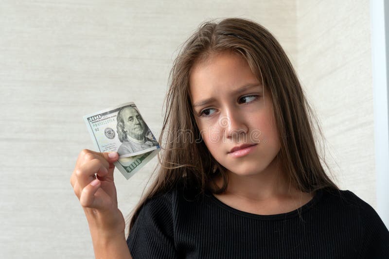 Not Enough Money. Sad Child with Money Dollar. White Background Stock ...