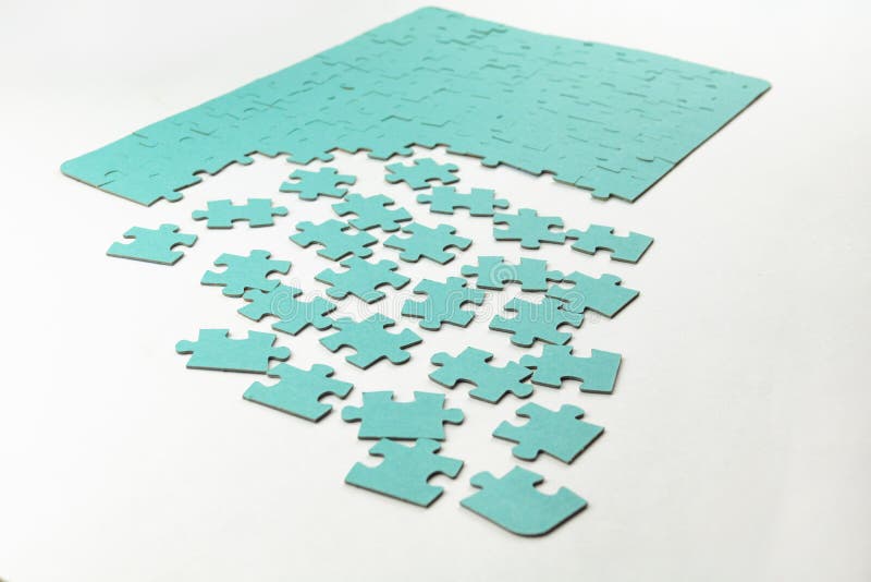 Not Fully Assembled Puzzle in Blue on a Light Background Stock Image ...