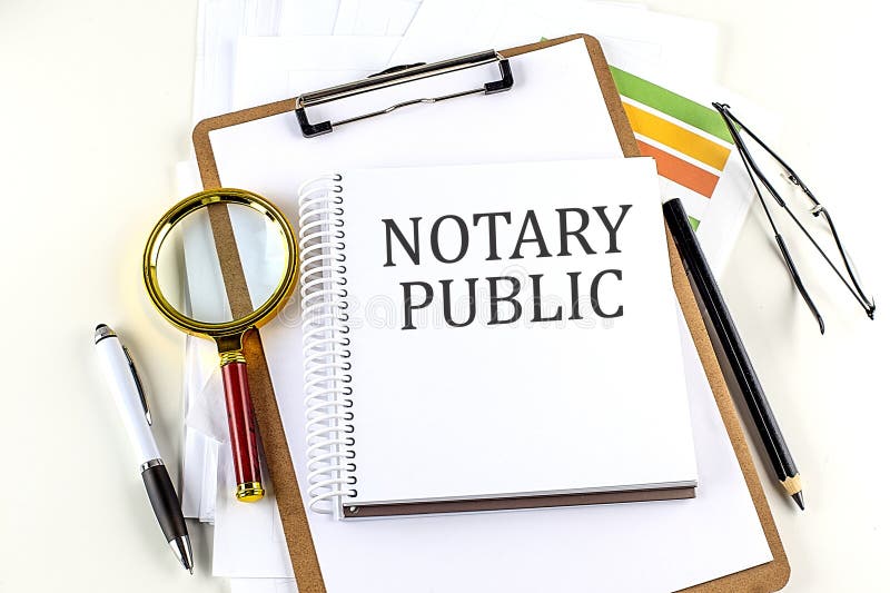 NOTARY PUBLIC Text on Notepad on Clipboard with Chart on Blue ...