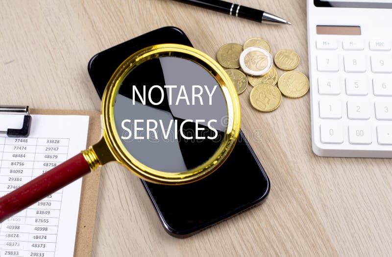 NOTARY SERVICES Text on the Magnifier with Smartphone, Calculator and ...