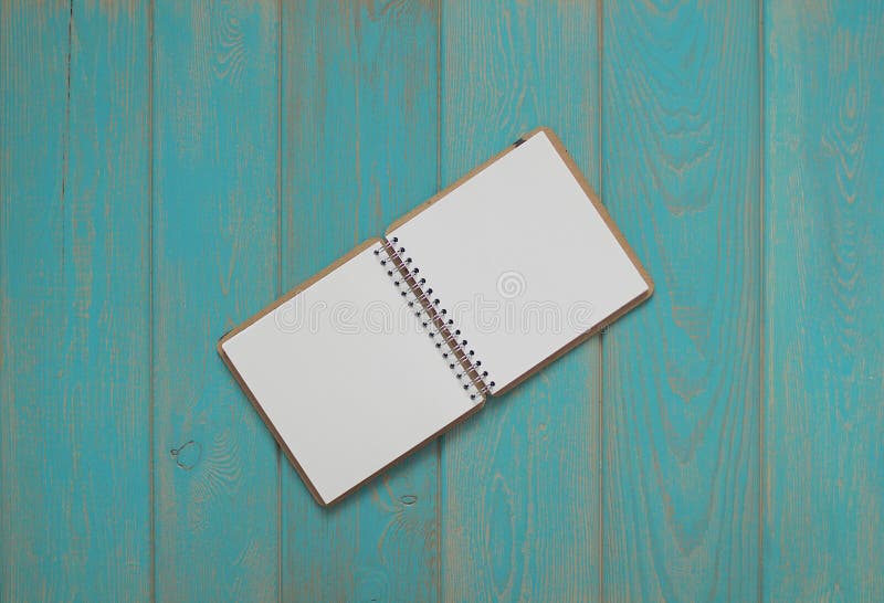 Note Book on Blue Wooden Desk. Stock Image - Image of blank, desk: 72163351